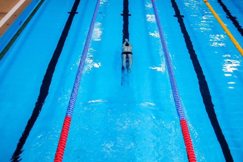 Improve Your Kick and Distance Per Stroke with Catch-Up Drill