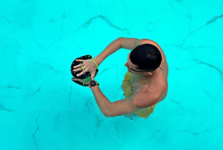 8 Benefits of Swim Paddles (Technique and Speed)